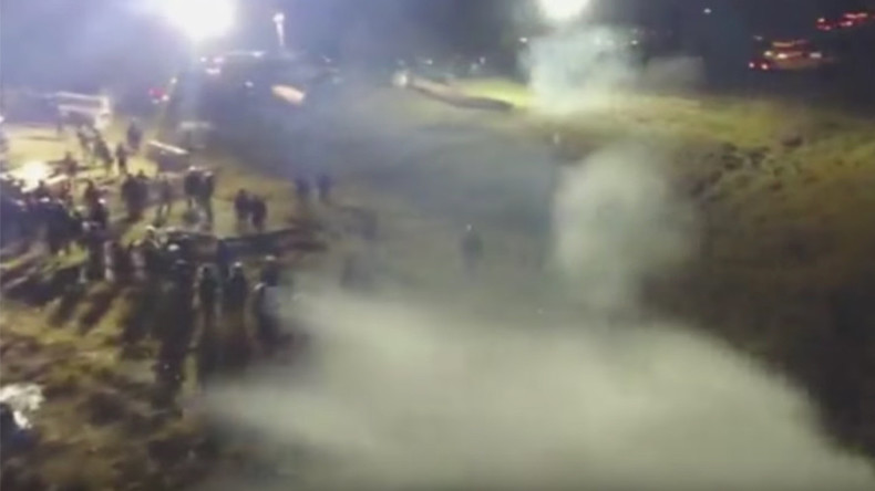 Drone narrowly escapes water cannon jet during DAPL protest (VIDEO ...
