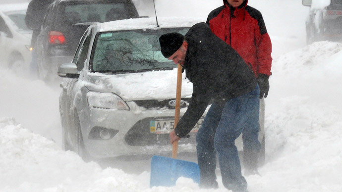 APCs deployed on Kiev streets, emergency as record snowfall turns ...