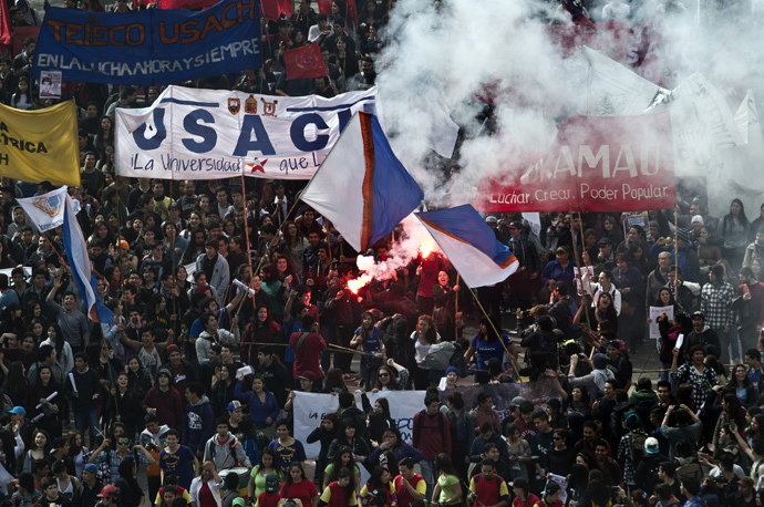 Clashes in Chile as thousands of students protest lagging education ...