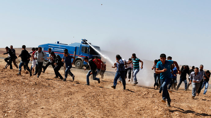 Tear gas, clashes, fatality: Anti-ISIS rally in Turkey turns violent ...